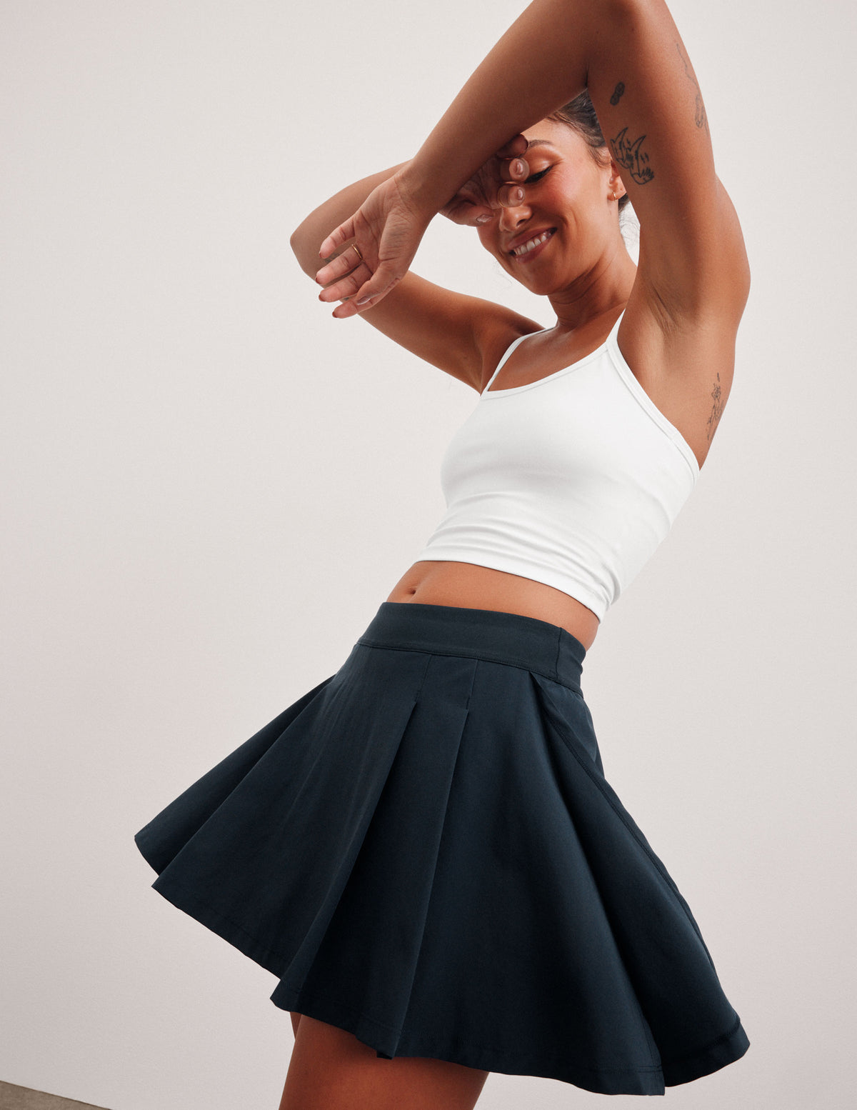 Mini Pleated Built In Shorts Skirt - Nocturnal Navy | Beyond Yoga